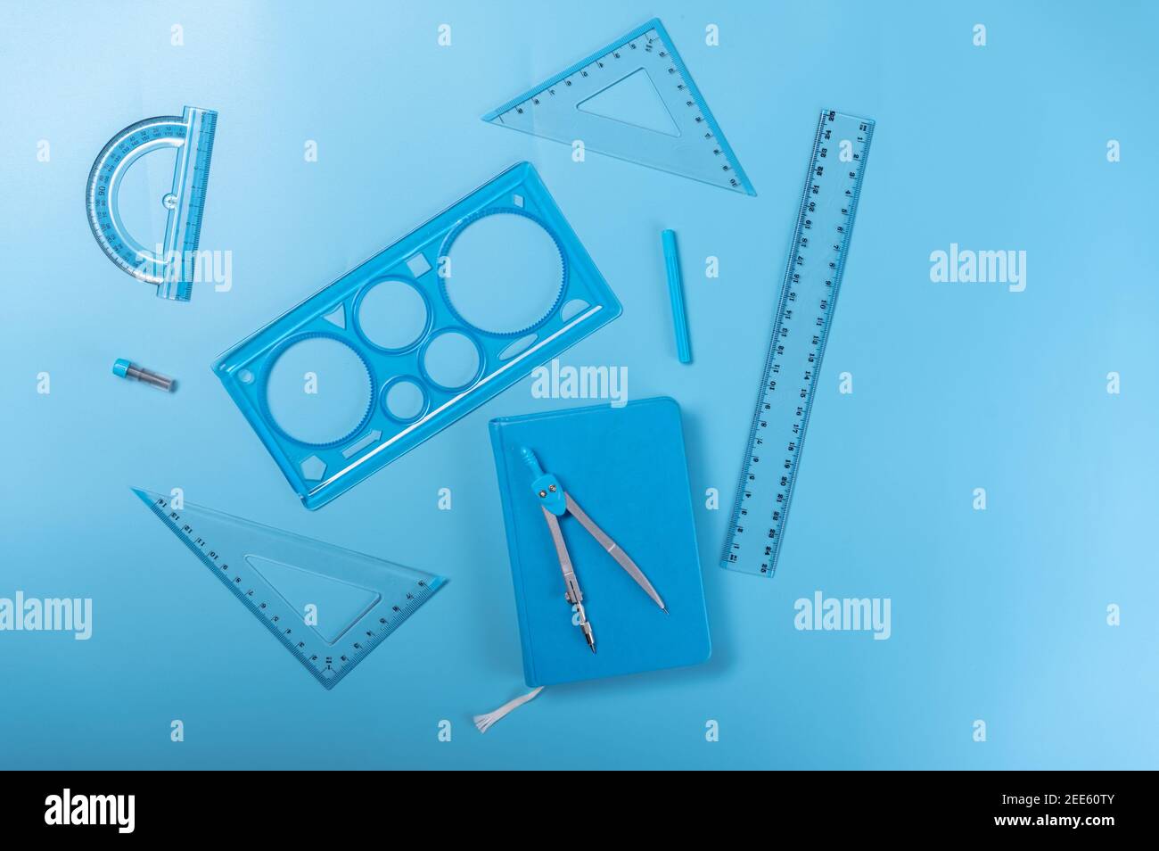 Items of the same color. Items for sketching. Notepad and rulers. Top ...