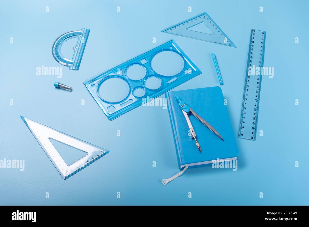 Compasses and rulers. Compass and notepad. Compasses and rulers for ...