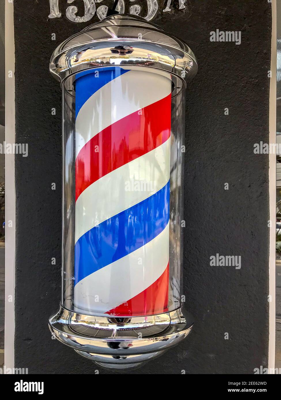 Barber pole. red white and blue barber pole. hair salon. barber shop ...