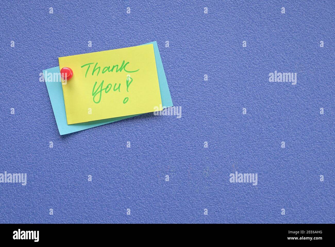 Thank you note pin on blue board. Copy space Stock Photo - Alamy