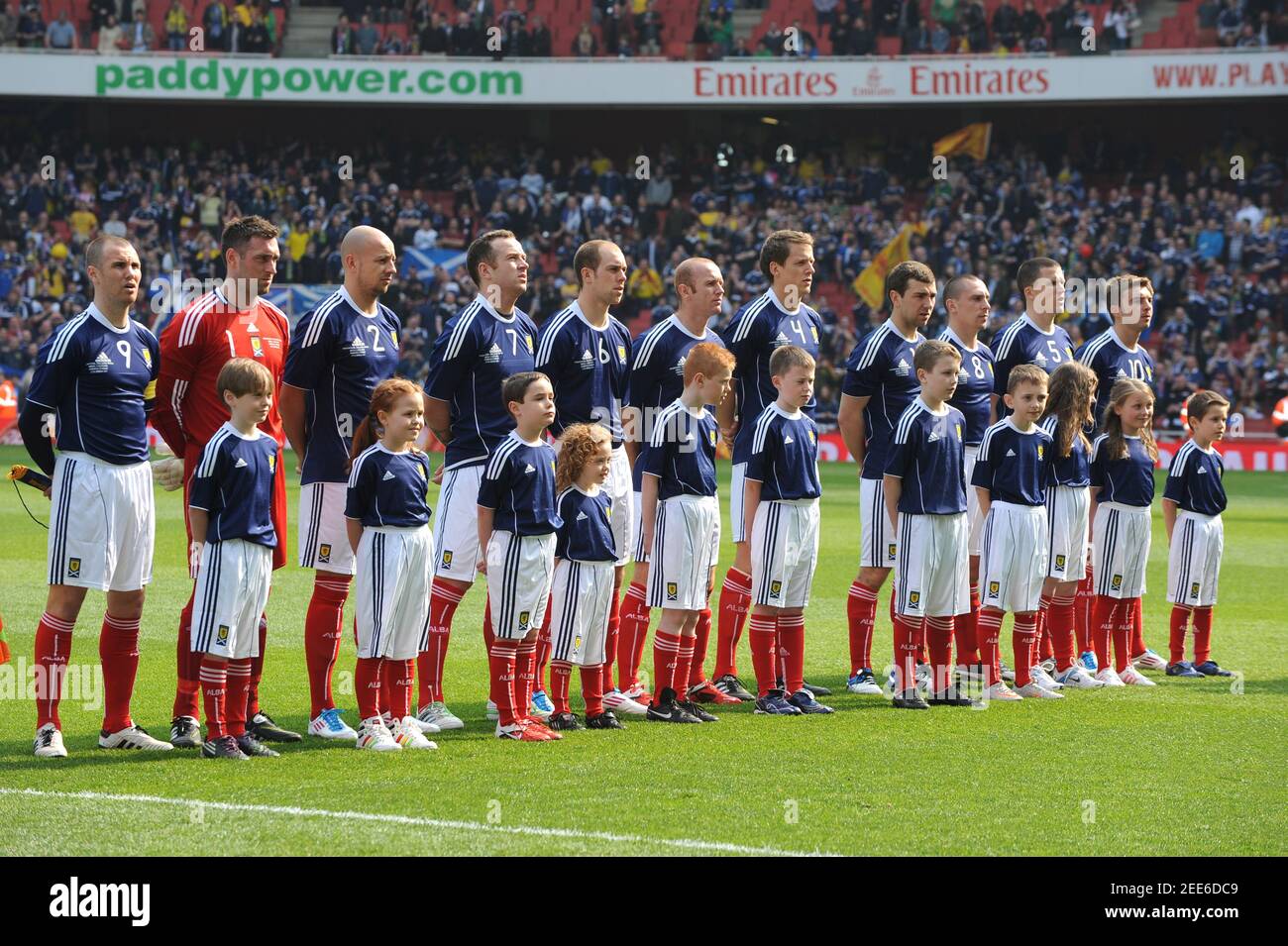 Scotland line up with the mascots before the game hi-res stock ...