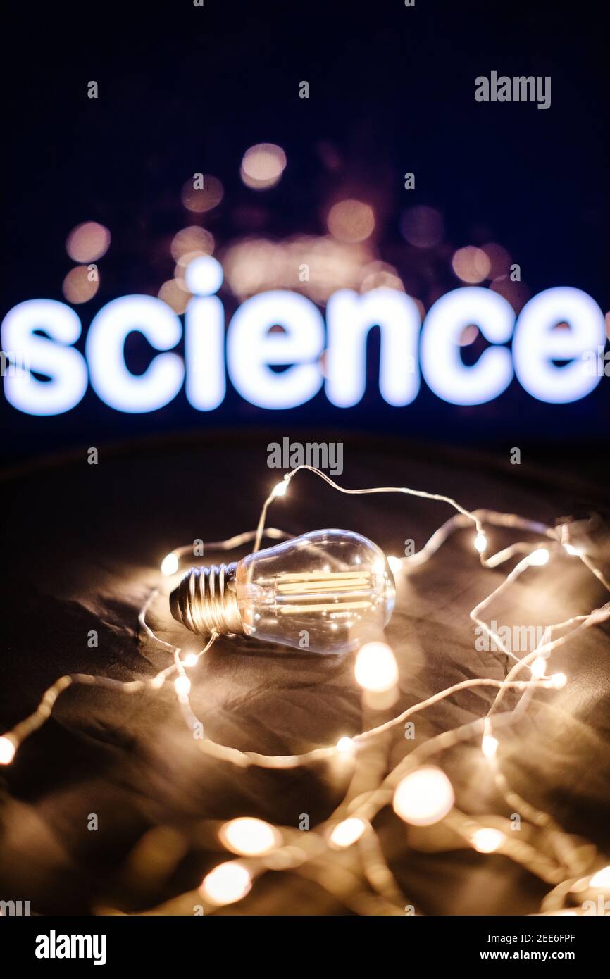 science light filament idea background Stock Photo - Alamy