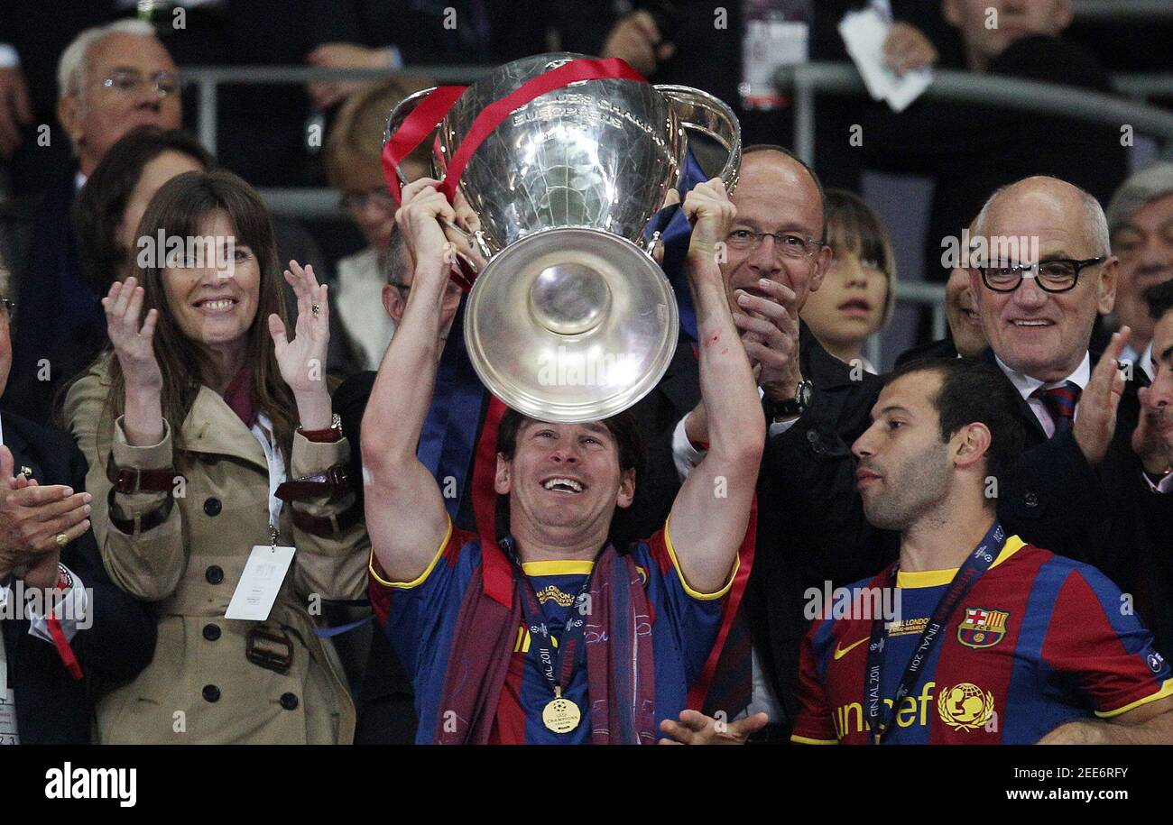 Barcelonas lionel messi celebrates winning the uefa champions league hi ...