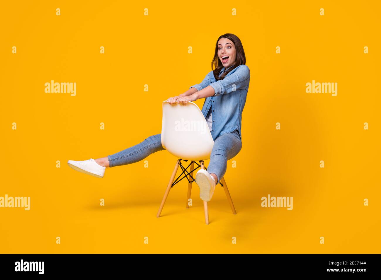 Full body photo of attractive pretty funny lady good mood sitting chair ...