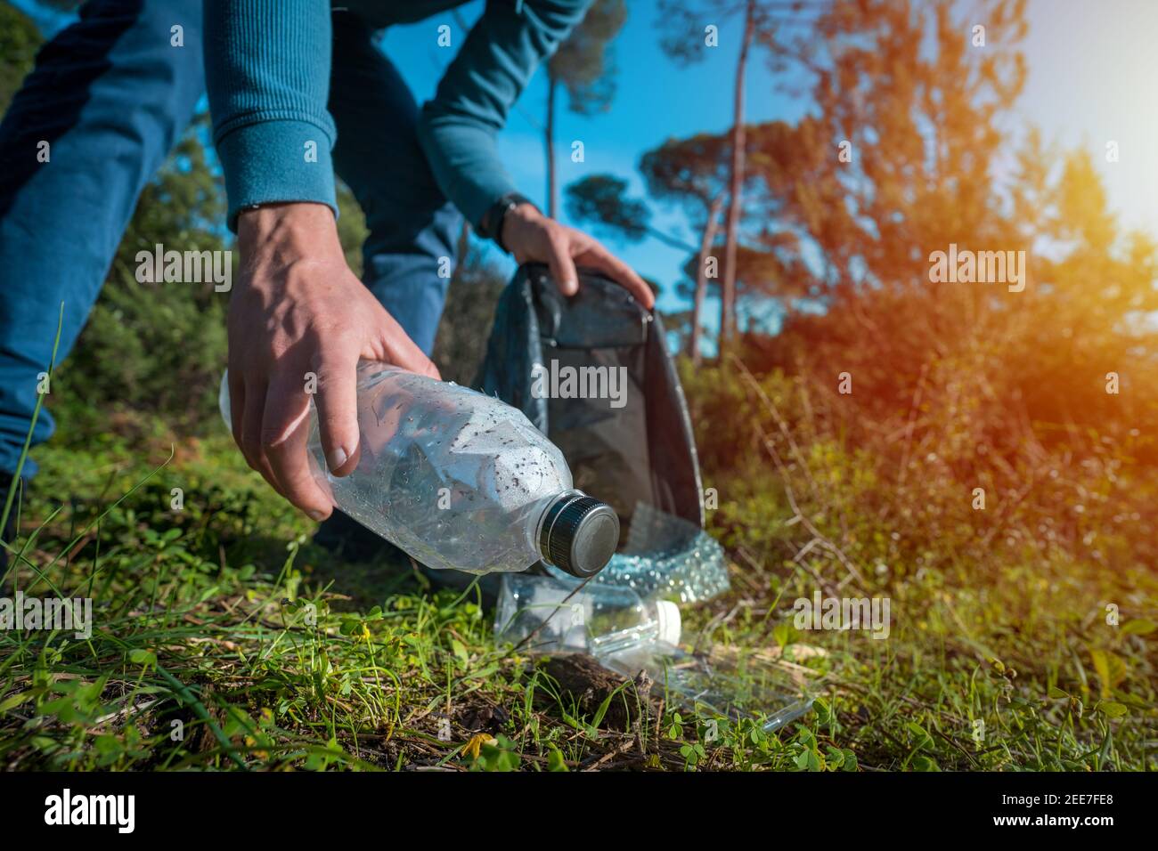 Cleaning environment picking up garbage hi-res stock photography and ...