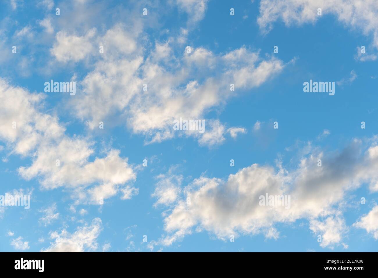 Beautiful airy, light clouds against a clear blue sky. Space for text ...
