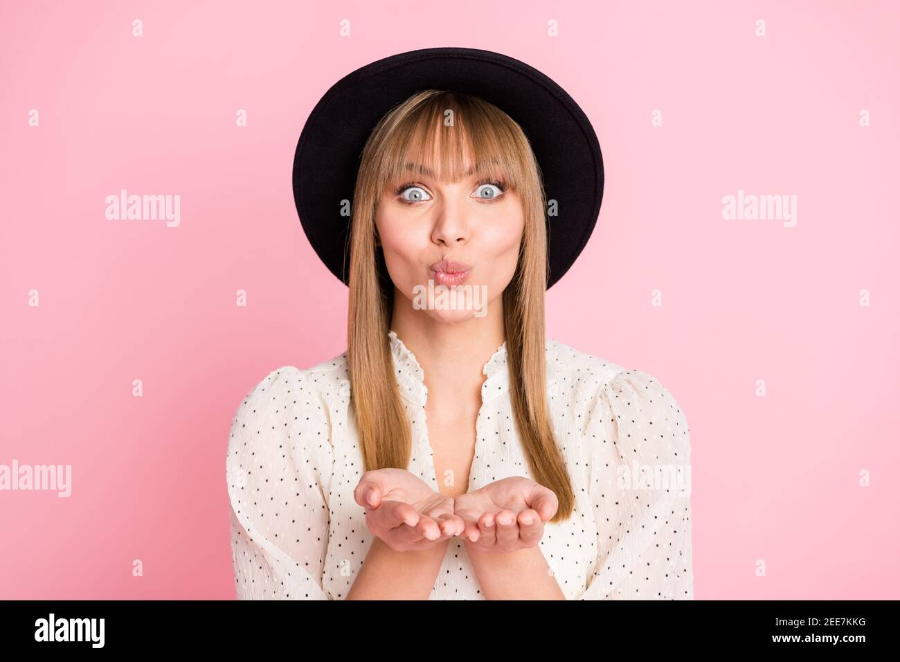 Photo of lovely flirty lady hold palms send airk kiss you wear retro ...
