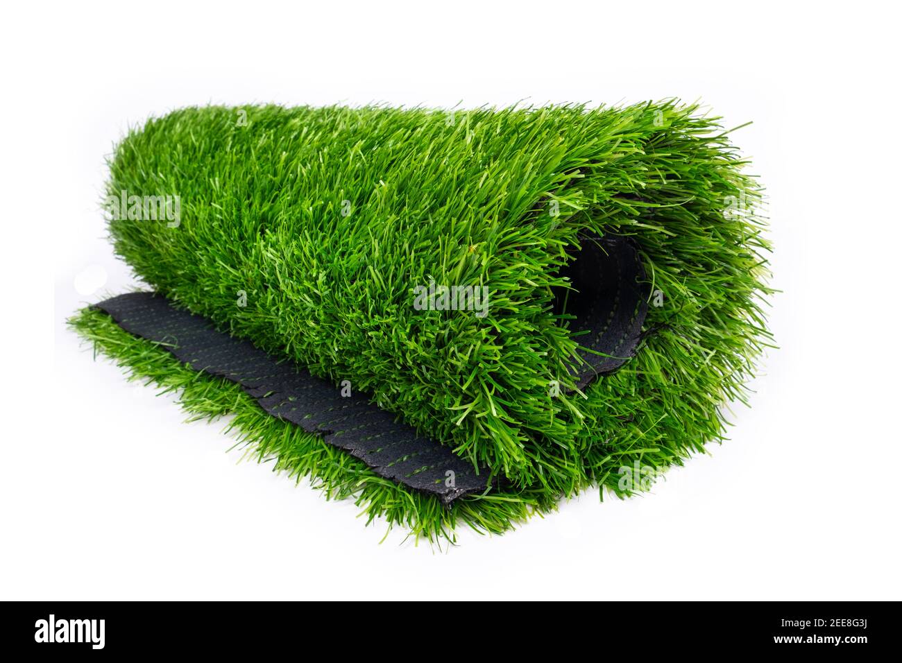 plastic roll of green grass on white background Stock Photo - Alamy