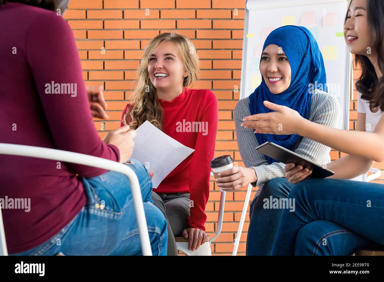 Diverse group of people meeting hi-res stock photography and images - Alamy