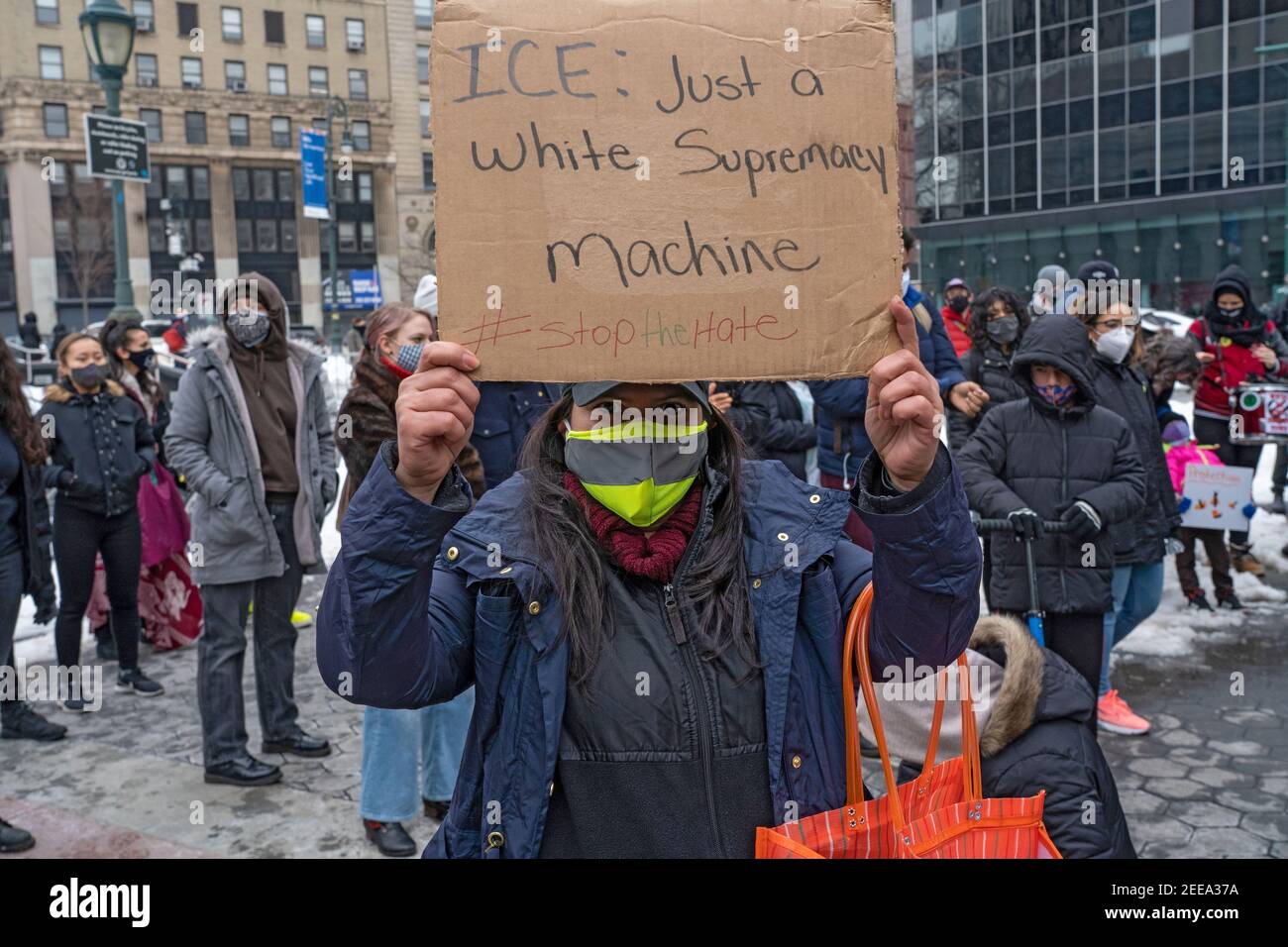 NEW YORK, NY - FEBRUARY 15: A protester holds a sign at Foley Square ...