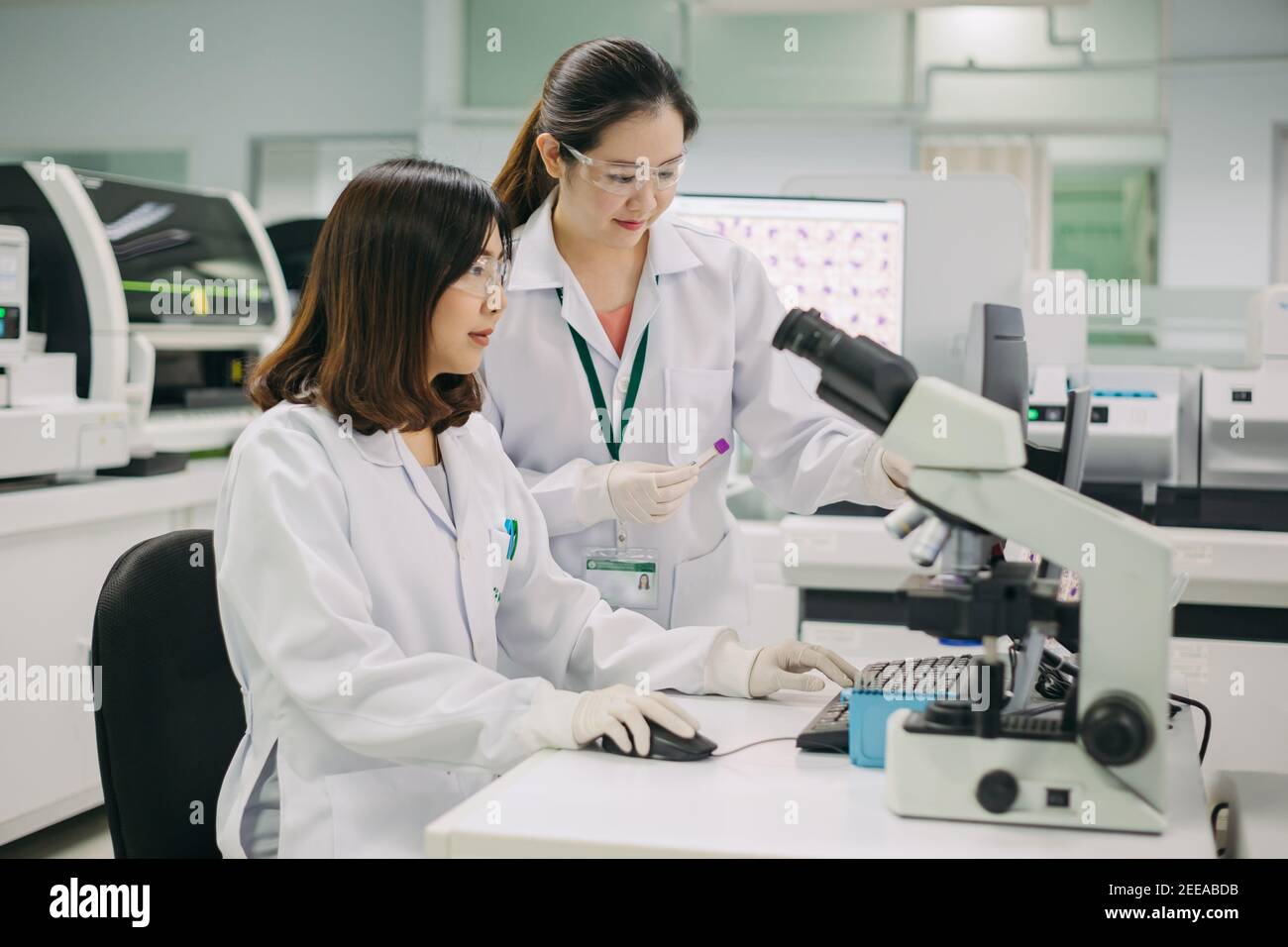 Medical doctor working for analyzing blood samples in laboratory of ...