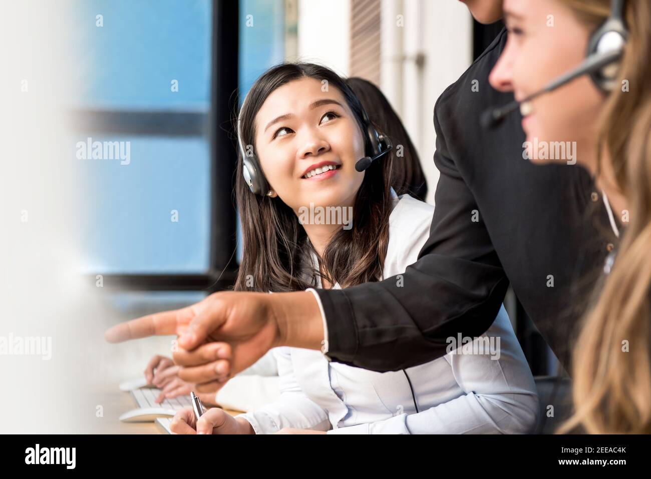 Worker being trained by supervisor hi-res stock photography and images ...