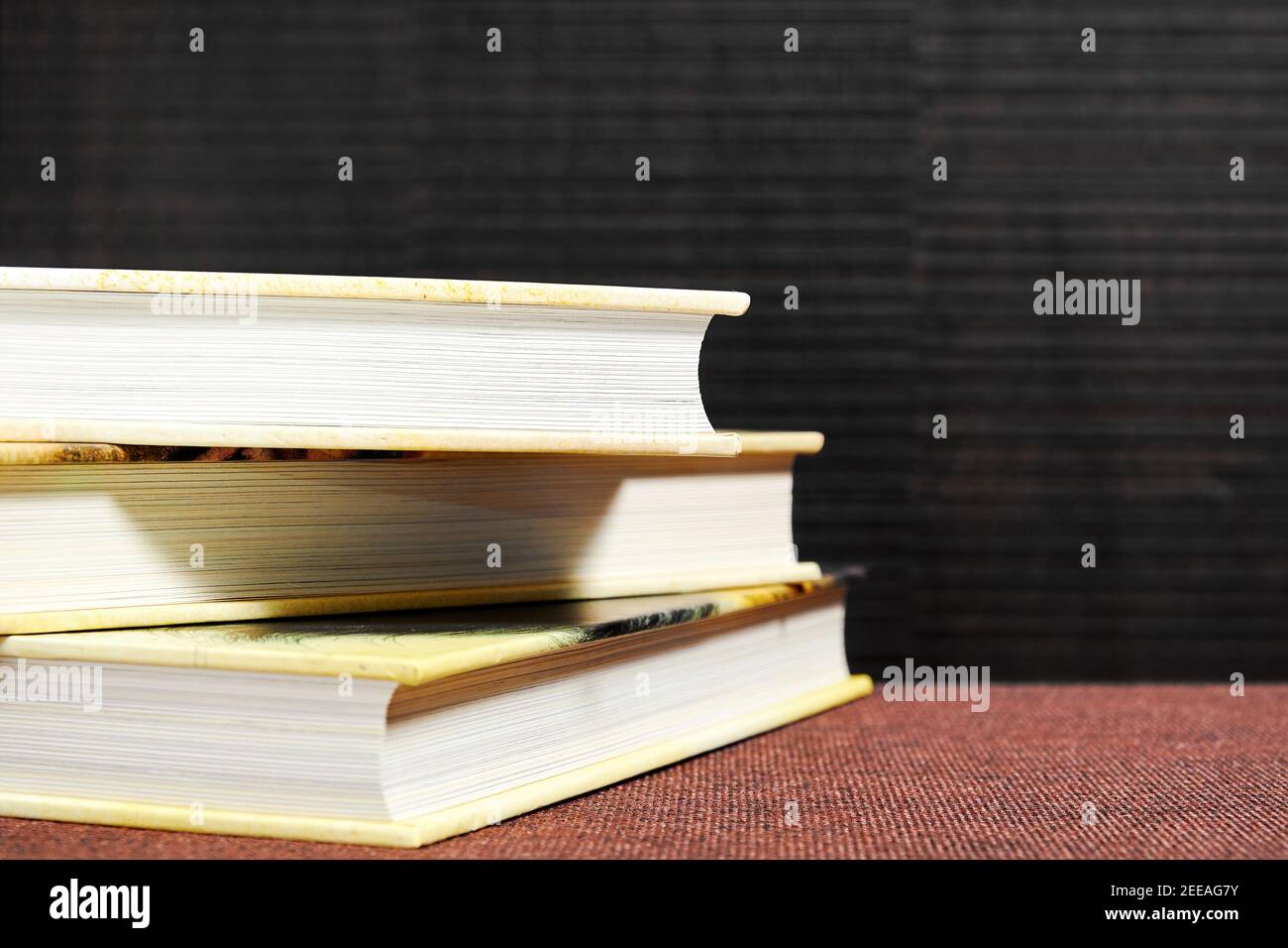 A messy heap of books on the bookshelf in the library. Bookstore ...