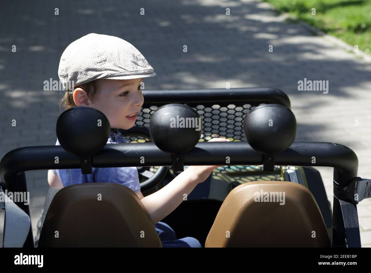 Child driving a jeep in the park Stock Photo - Alamy