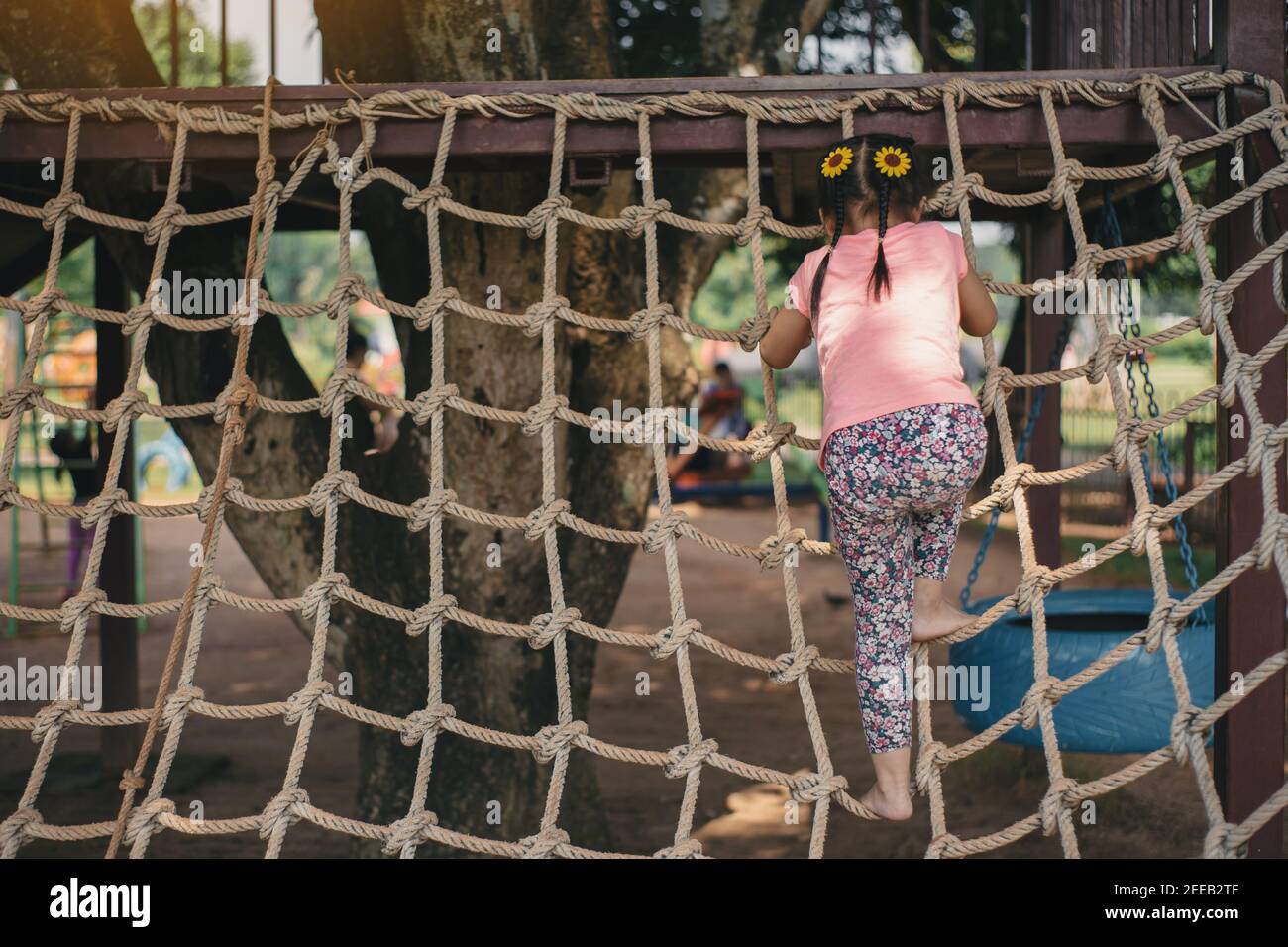 School kids play and learn in the playgound. Physical activity like ...