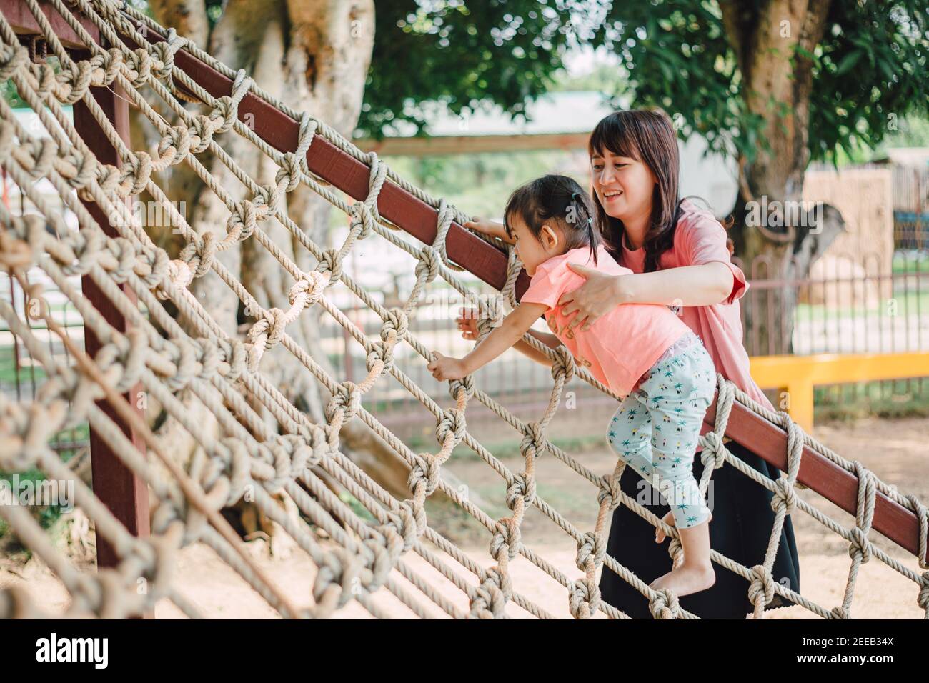 School kids play and learn in the playgound. Physical activity like ...