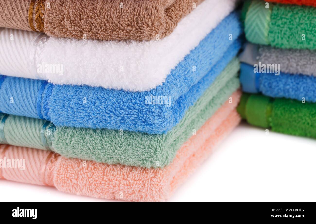 Colorful towels stacks closeup picture Stock Photo - Alamy