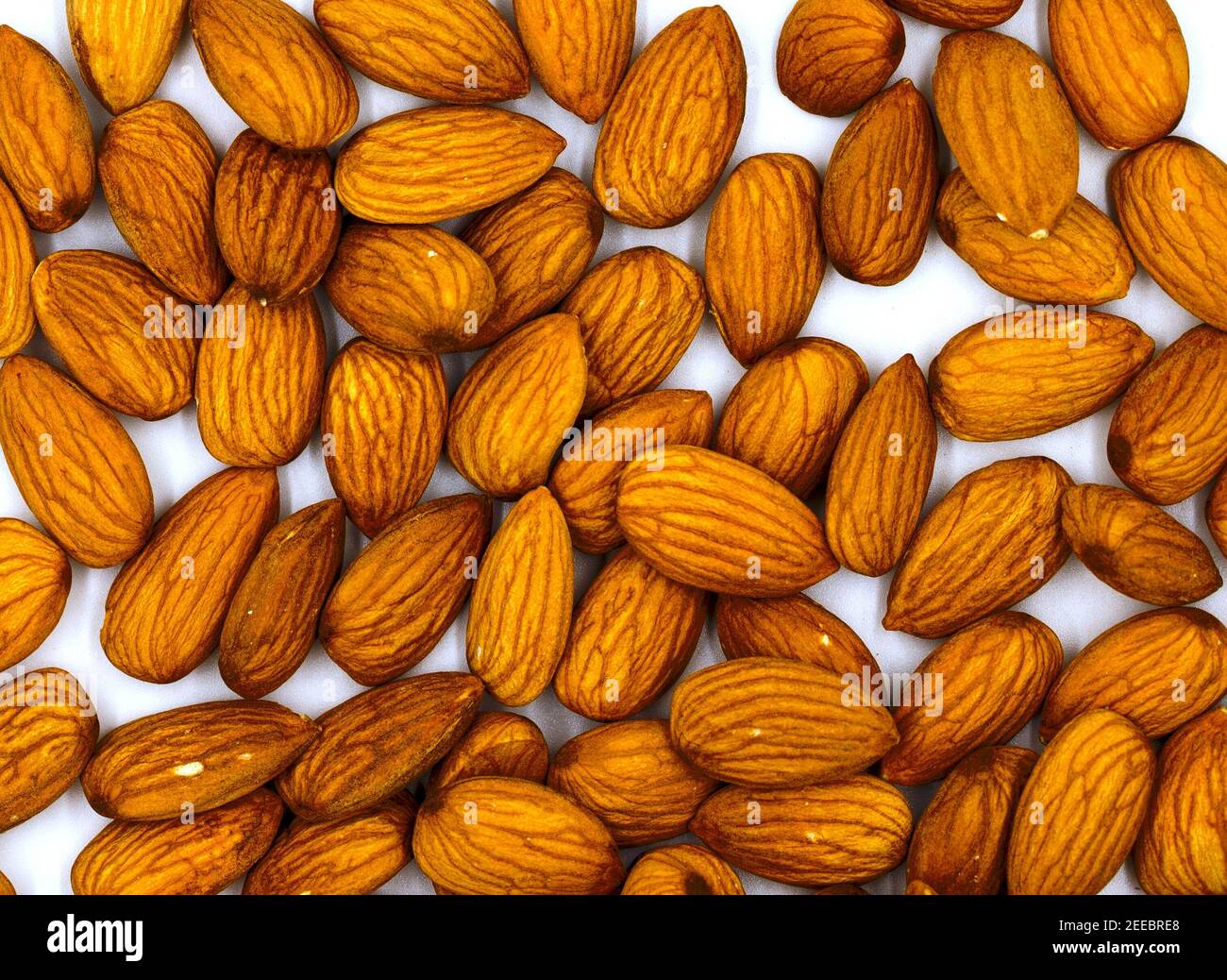 Almond nuts on white background with place for text. Almond nut flat ...