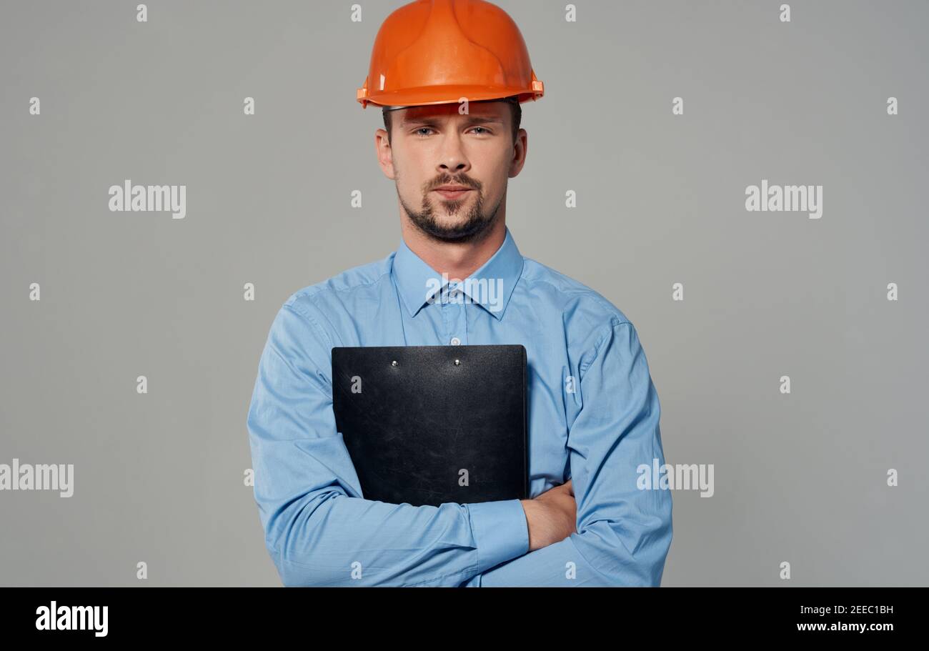 civil engineer architecture man in orange helmet Stock Photo - Alamy