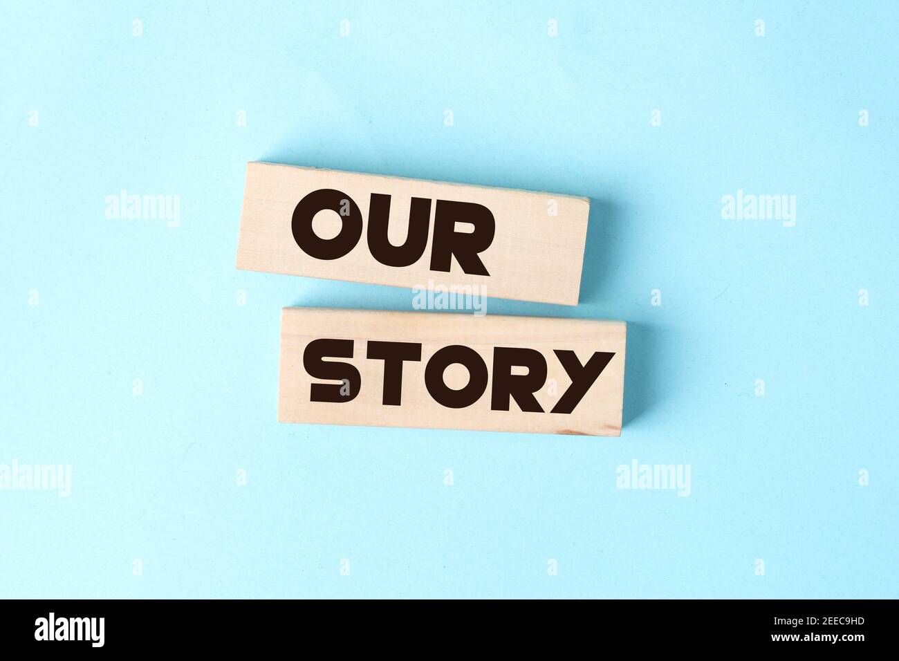OUR STORY words on wooden cubic building block . Business with history ...