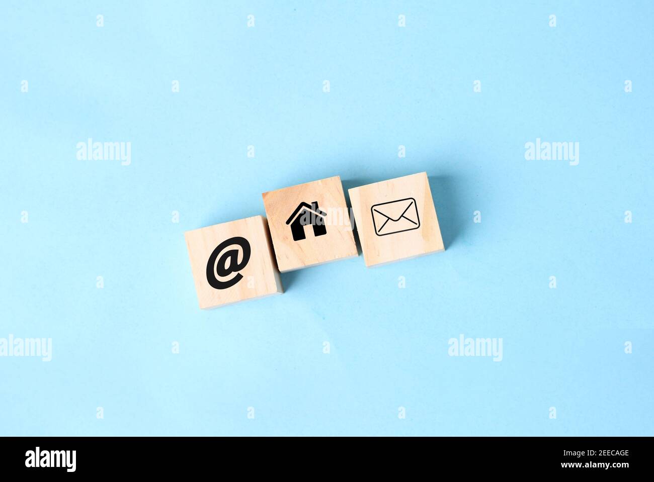 Wooden block cube symbol telephone, email, address and mobile phone ...