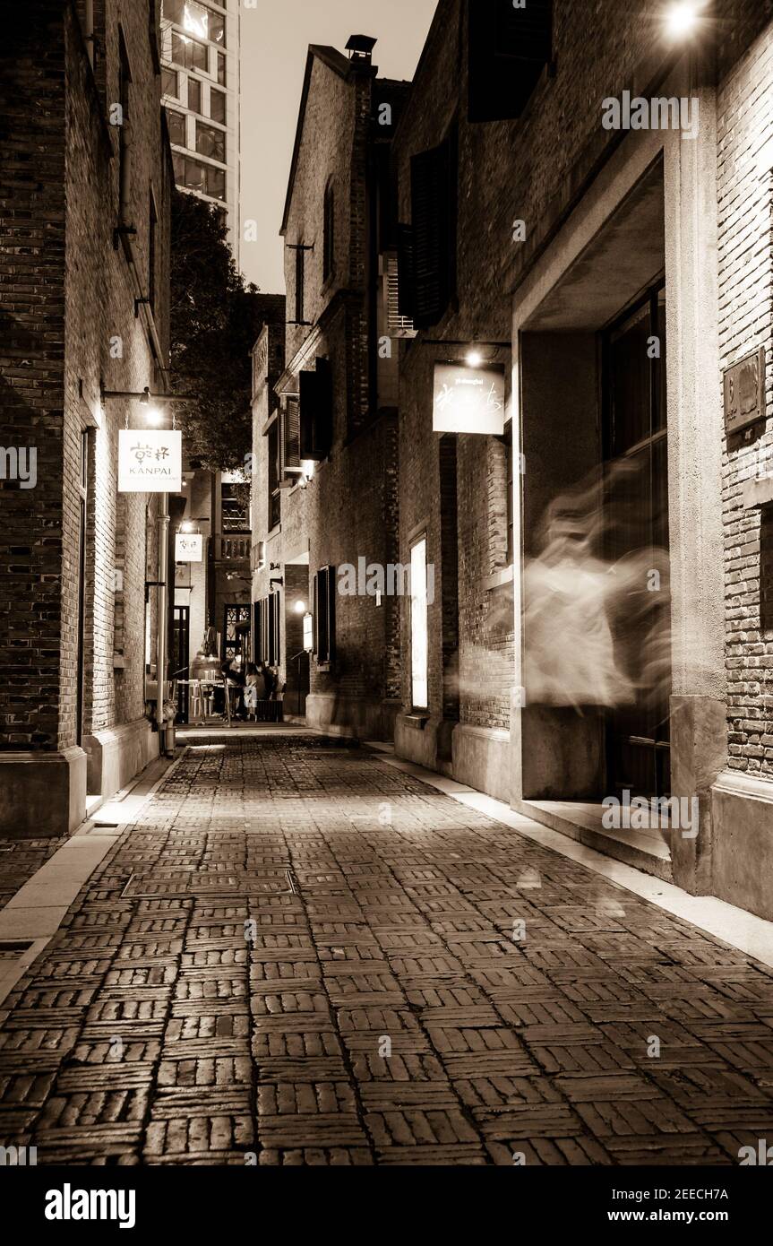 Ghosting effect in the evening in the back alleys of Shanghai’s ...