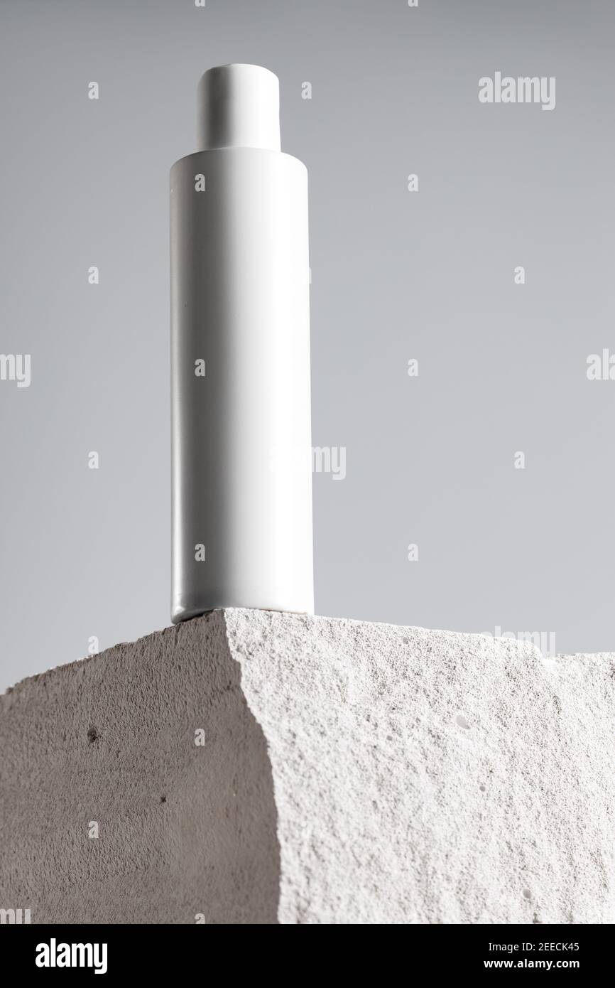Cosmetic jar on gray cinder block close up Stock Photo - Alamy