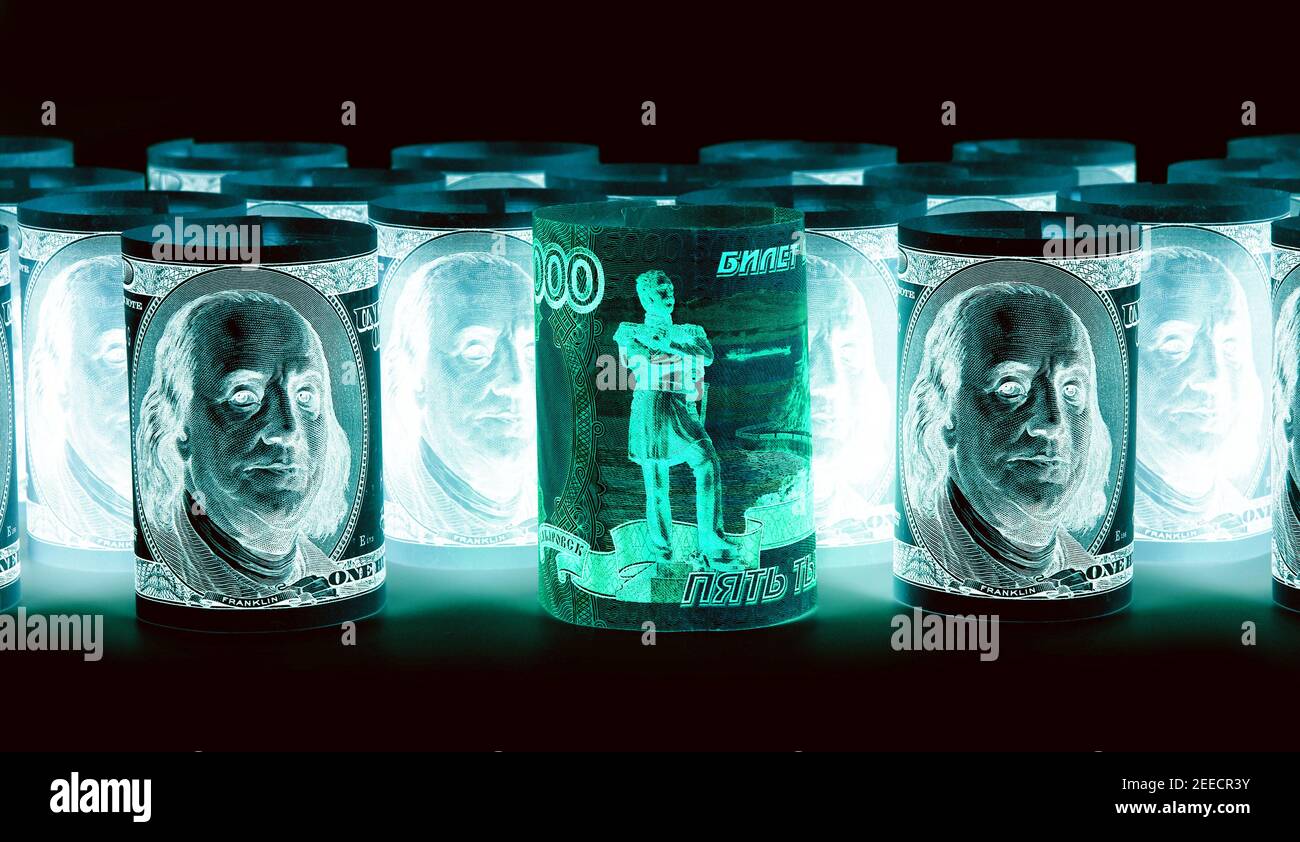 US dollars and Russian roubles banknotes in UV light protection Stock ...