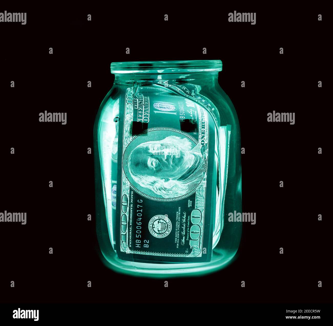 One hundred dollar bills (banknotes ) close up, U.S. currency-- in UV ...