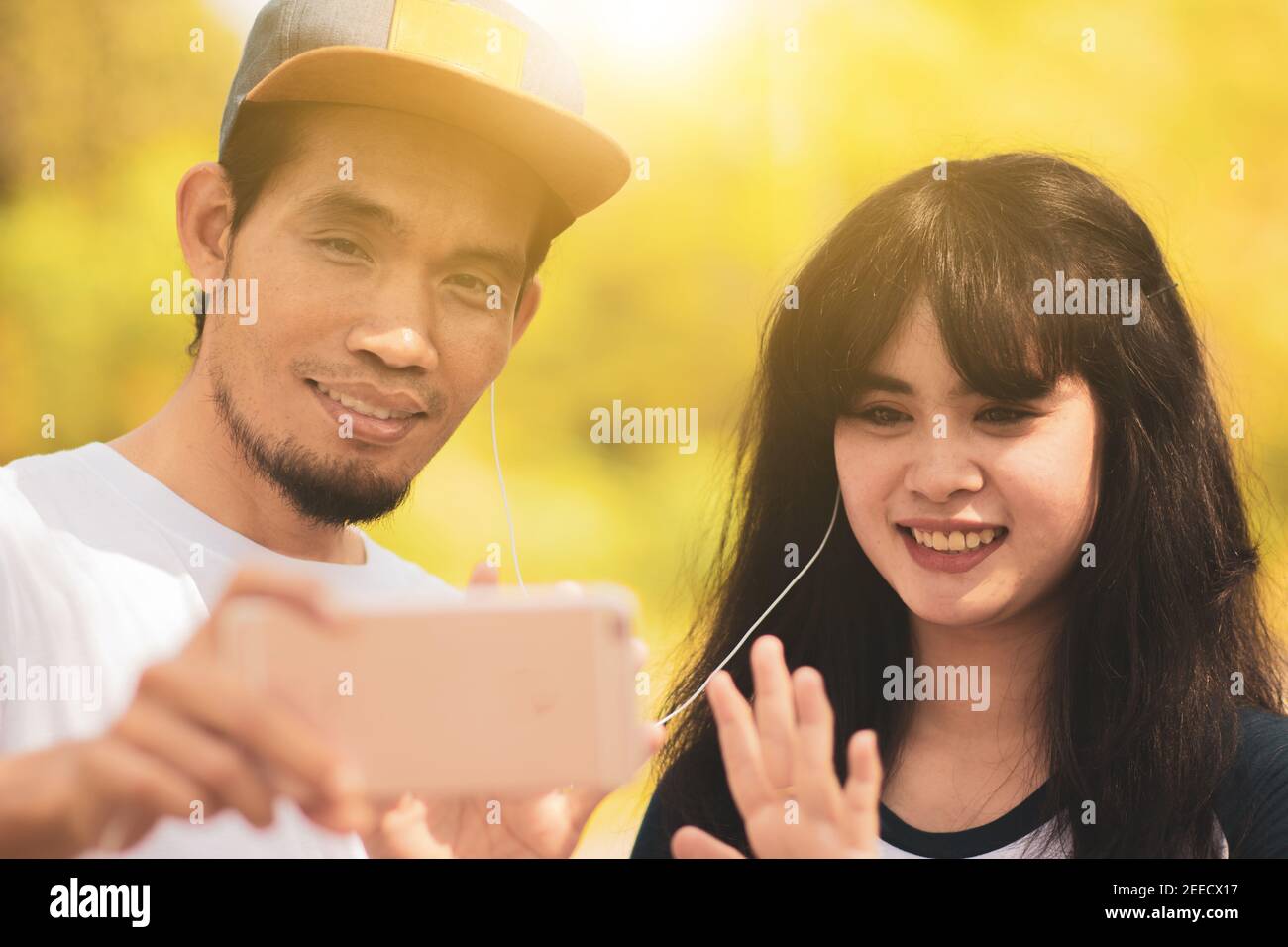 Asian couple People use tablet then smartphone connection social media ...