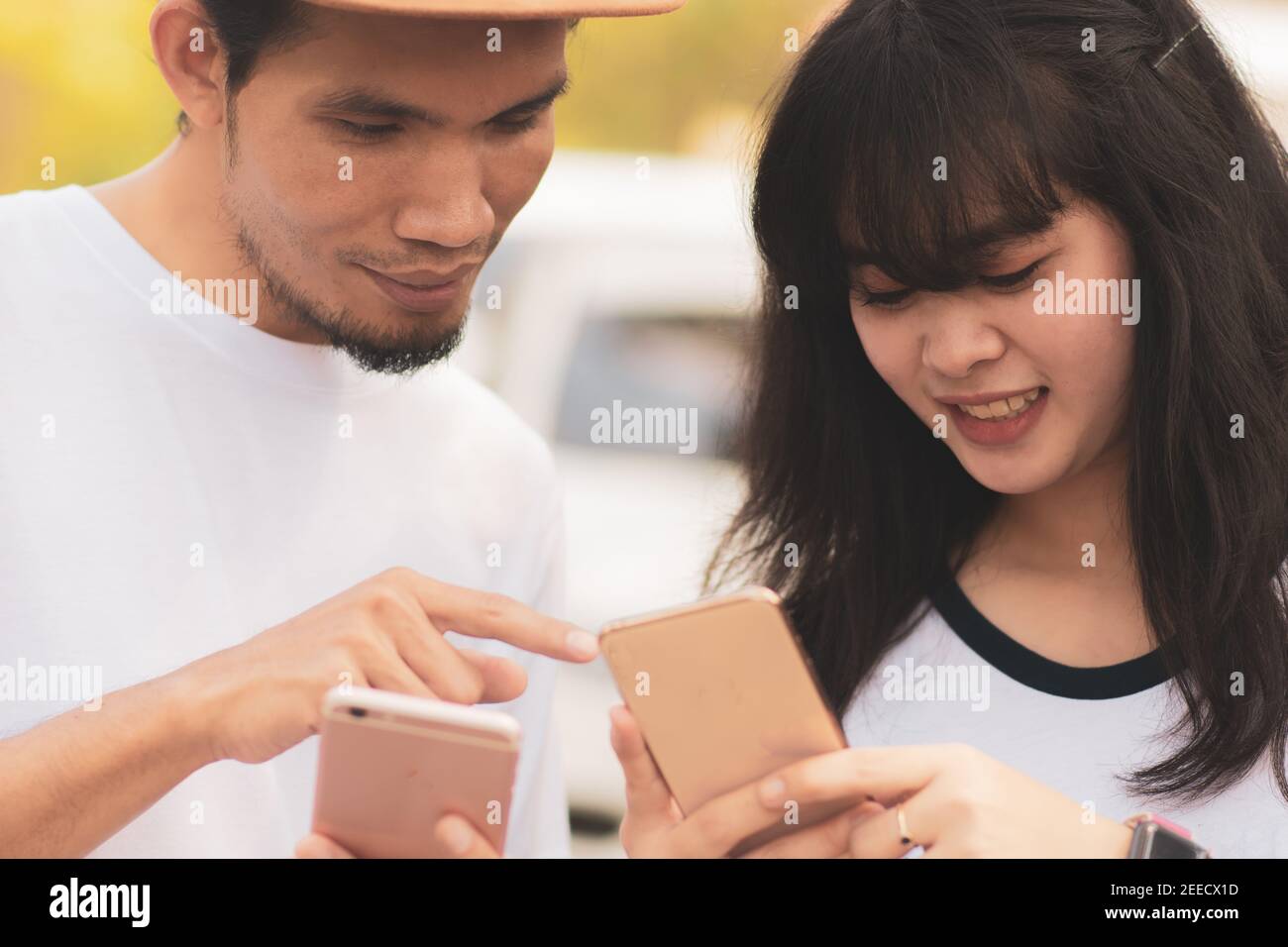 Asian couple People use tablet then smartphone connection social media ...
