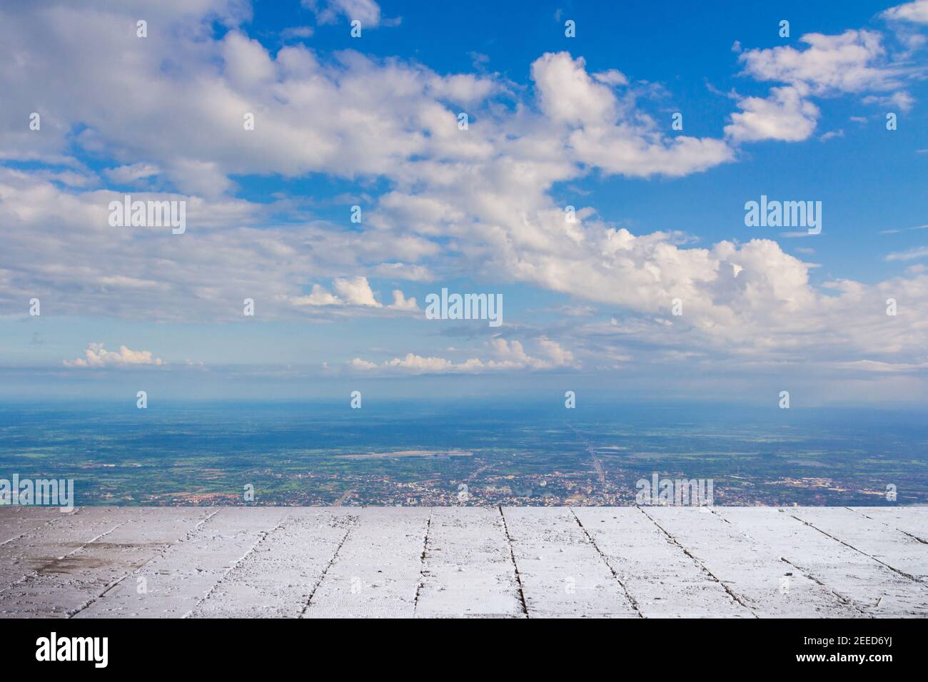 Blue sky land and white cloud background Stock Photo - Alamy