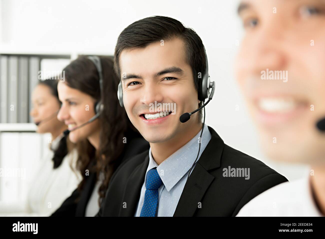 Happy hispanic female telemarketer headset hi-res stock photography and ...