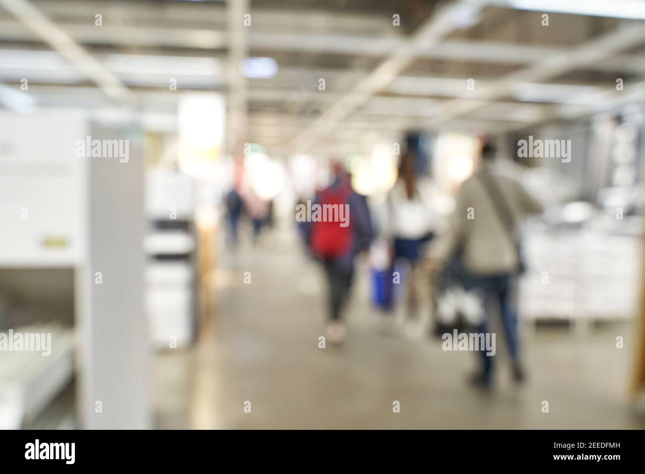Store blur background people furniture hi-res stock photography and ...