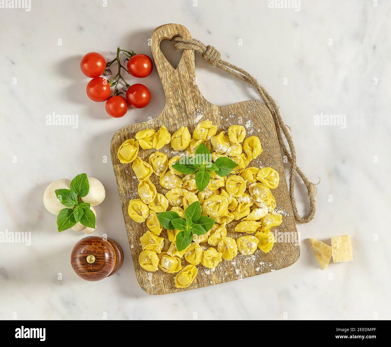 Homemade raw Italian stuffed pasta tortellini Stock Photo - Alamy