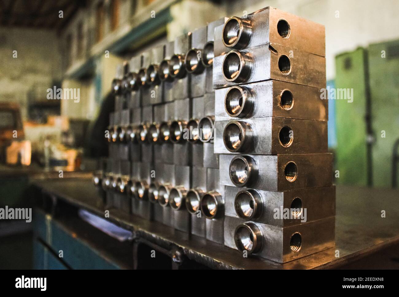 A stack of hydraulic valves in the production shop Stock Photo - Alamy