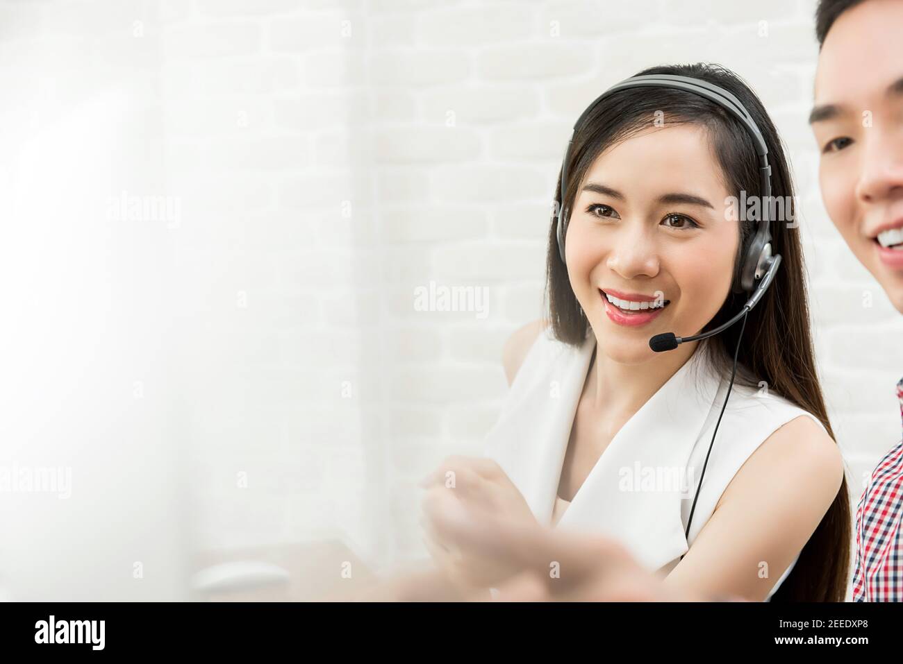 Asian chinese call center agent hi-res stock photography and images - Alamy