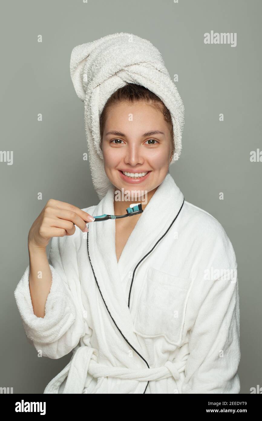 Young healthy woman brushing her teeth, morning routine Stock Photo - Alamy