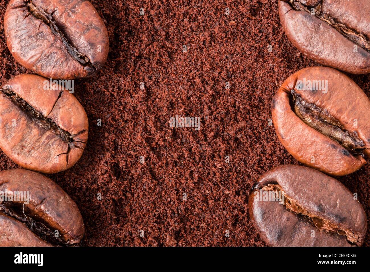 ground coffee beans background macro close up Stock Photo - Alamy