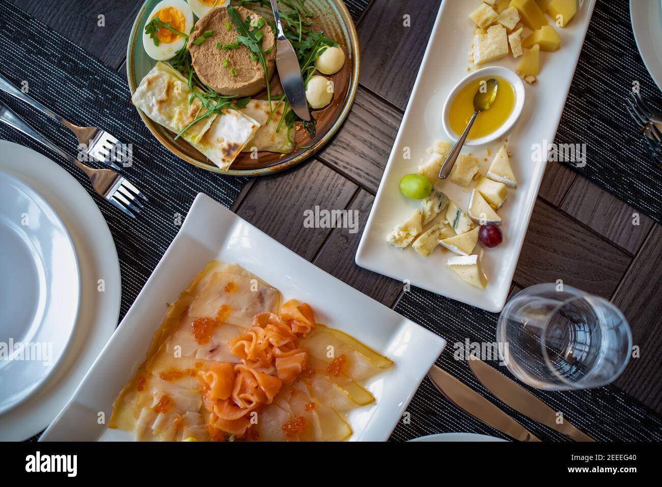 catering table set service with silverware and glass stemware at ...
