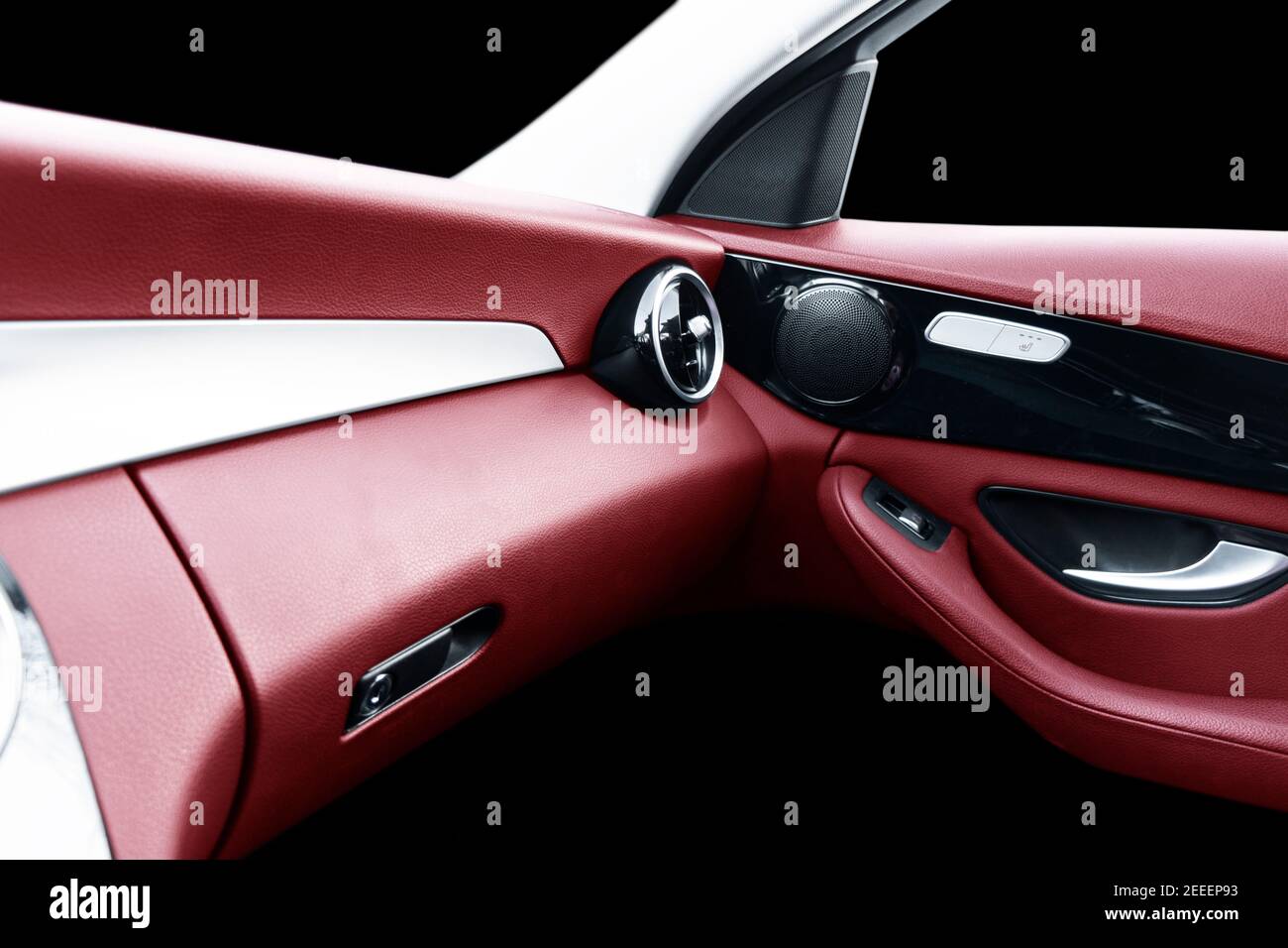 Car door handle inside the luxury modern car with red leather texture ...