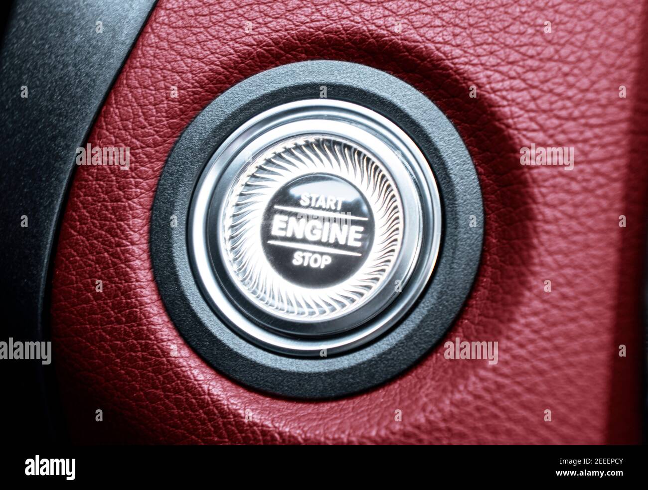 Car dashboard with focus on red engine start stop button. Modern car ...