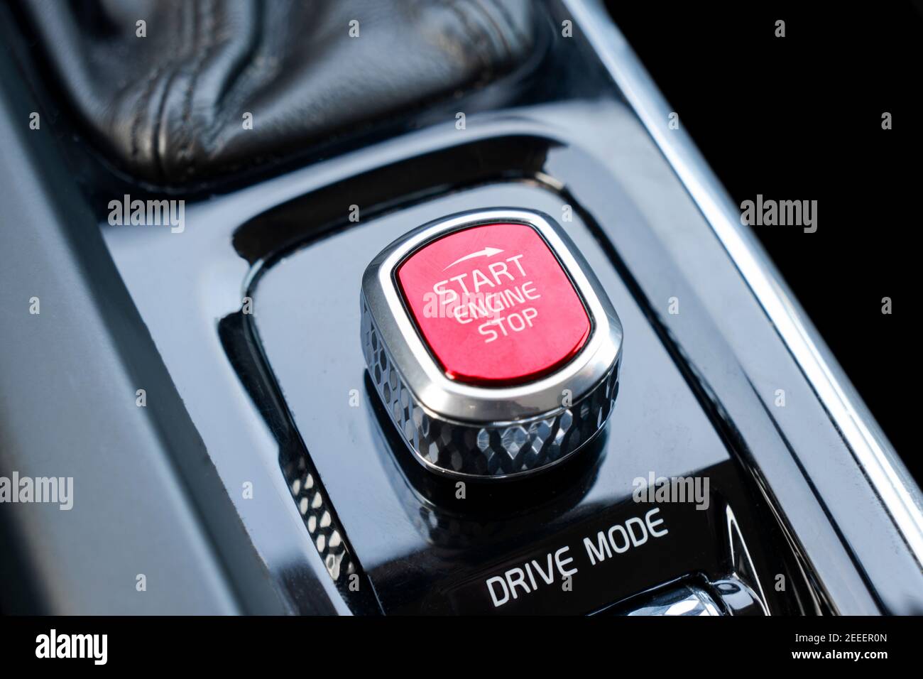 Car dashboard with focus on red engine start stop button. Modern car ...