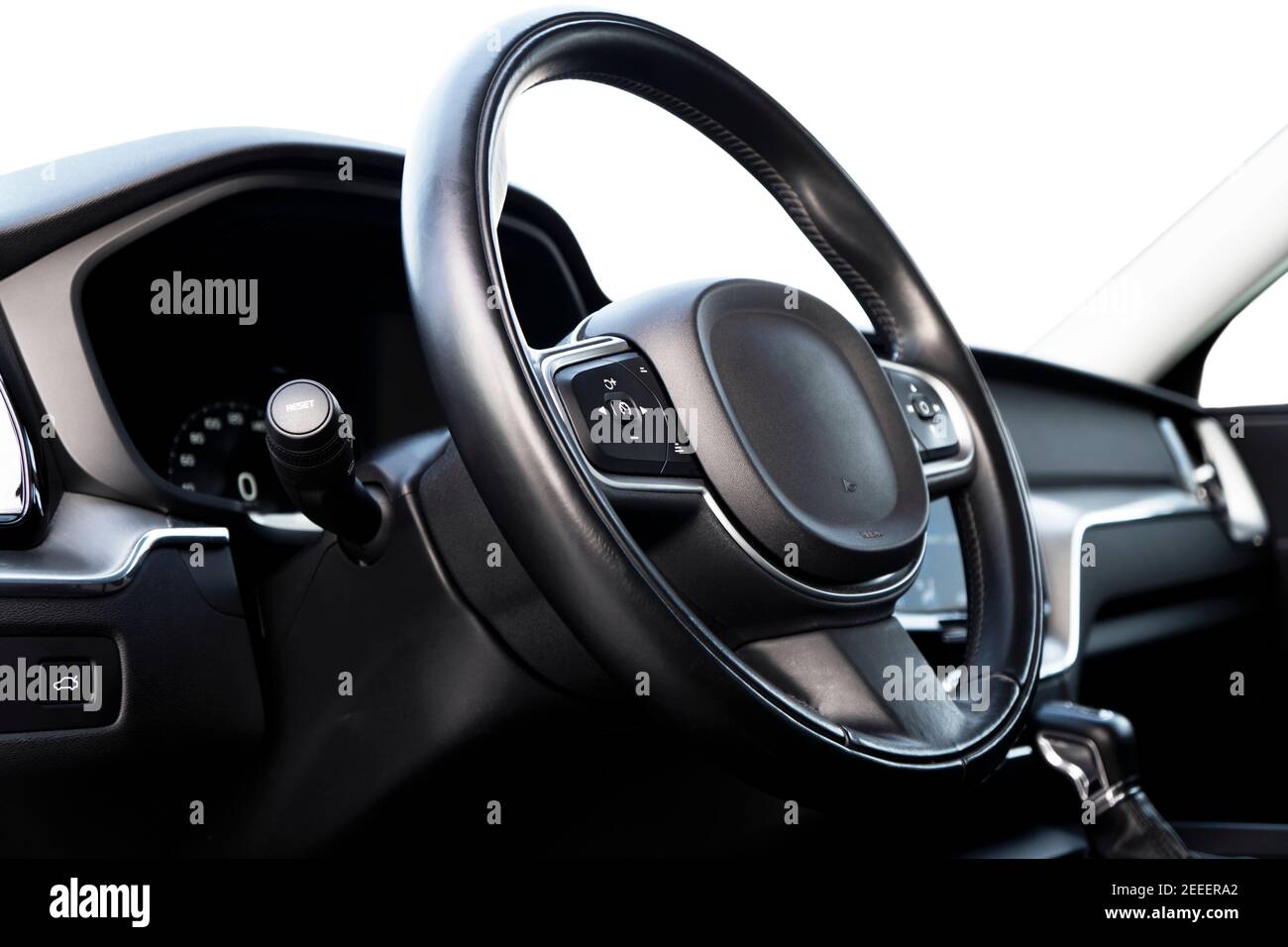 Black luxury modern car Interior. Steering wheel, shift lever and ...