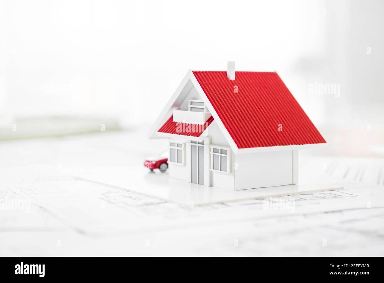 House model on blueprint paper - real estate and property concept Stock ...