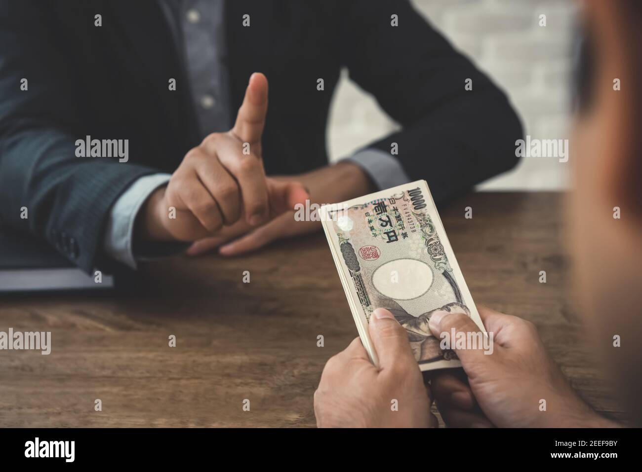 Businessman refusing money, Japanese yen bills - anti bribery and ...