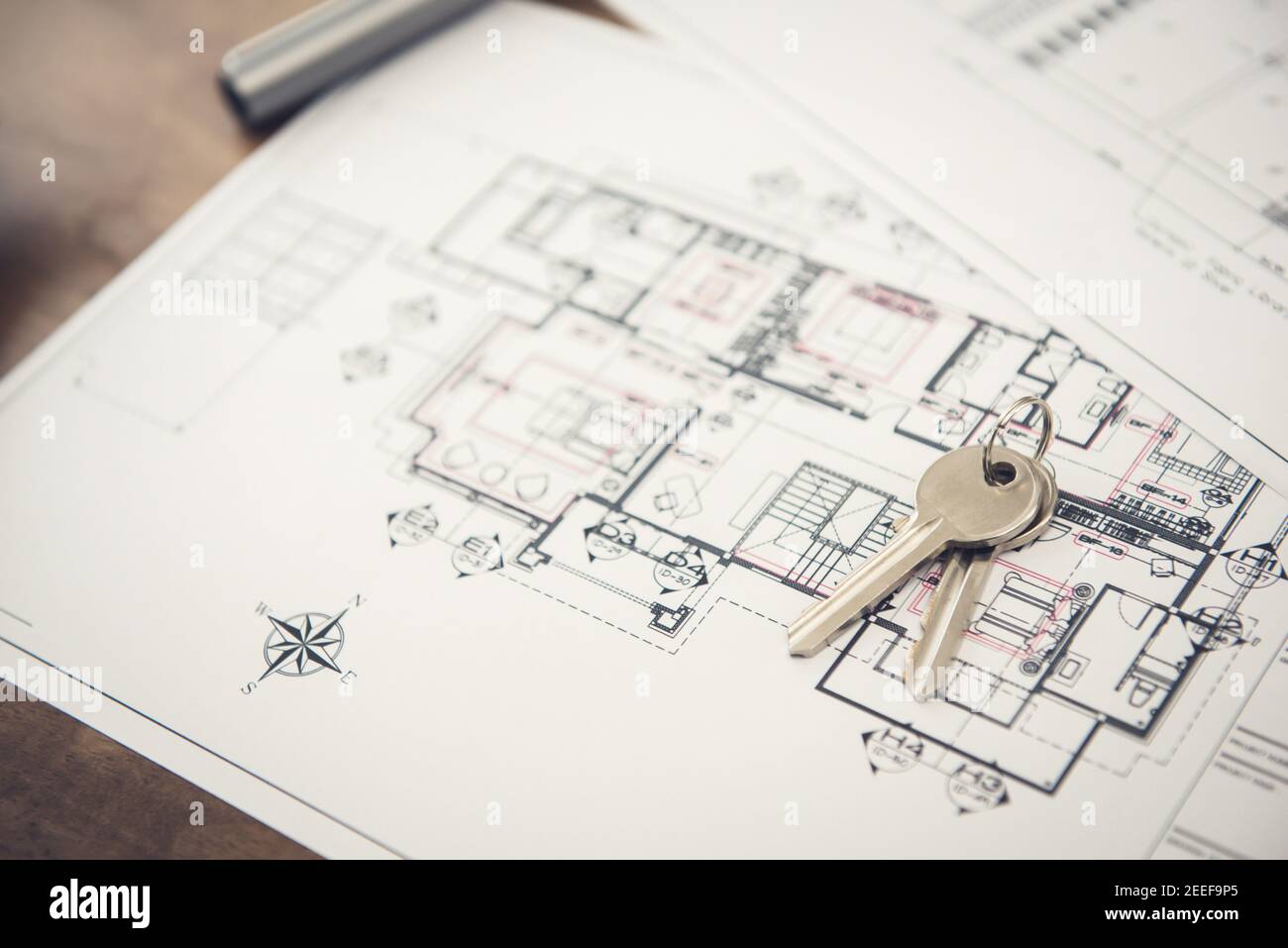 House keys on blueprint paper - properties and real estate concept ...