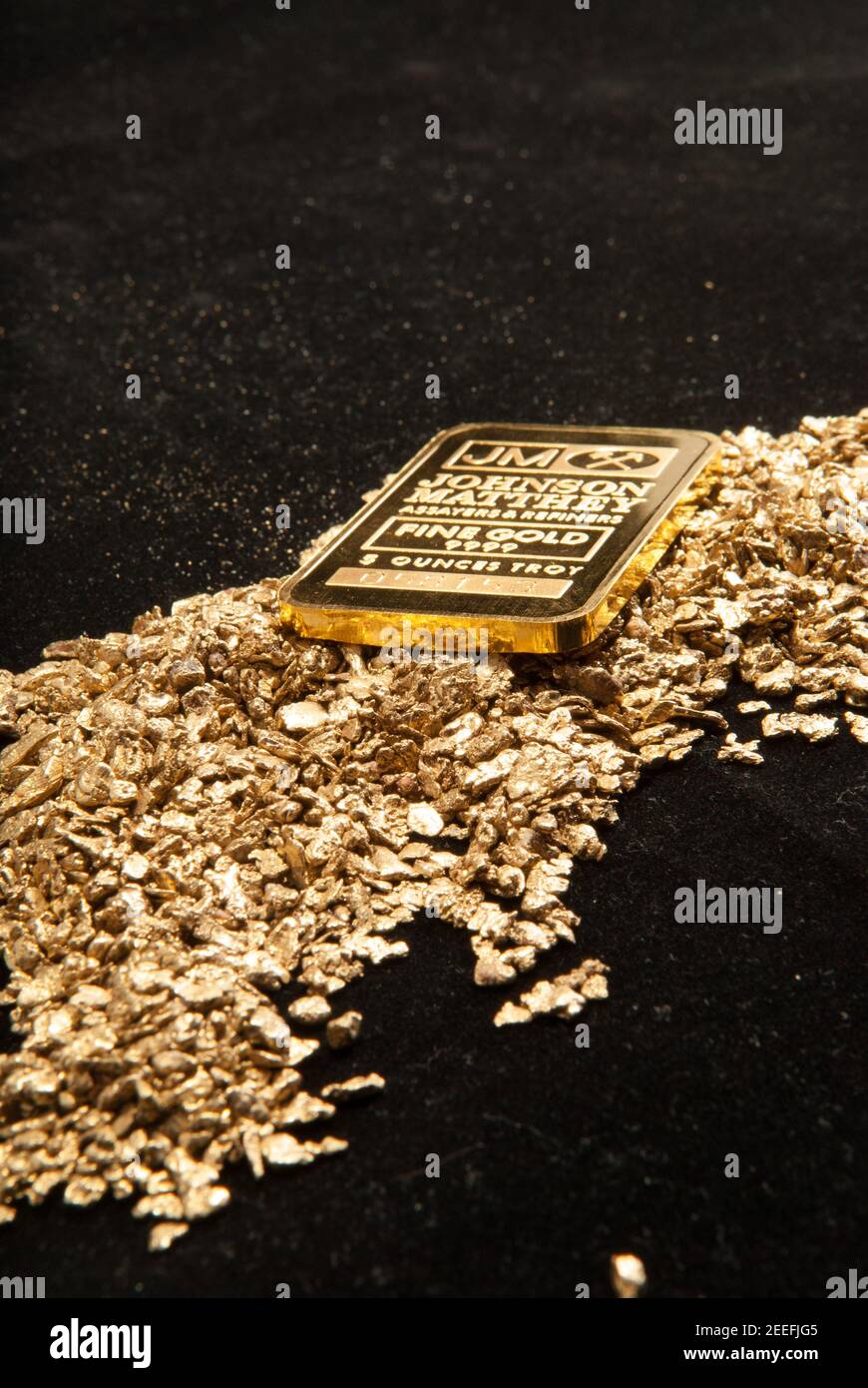 gold in coins, nuggets and ingots Stock Photo - Alamy