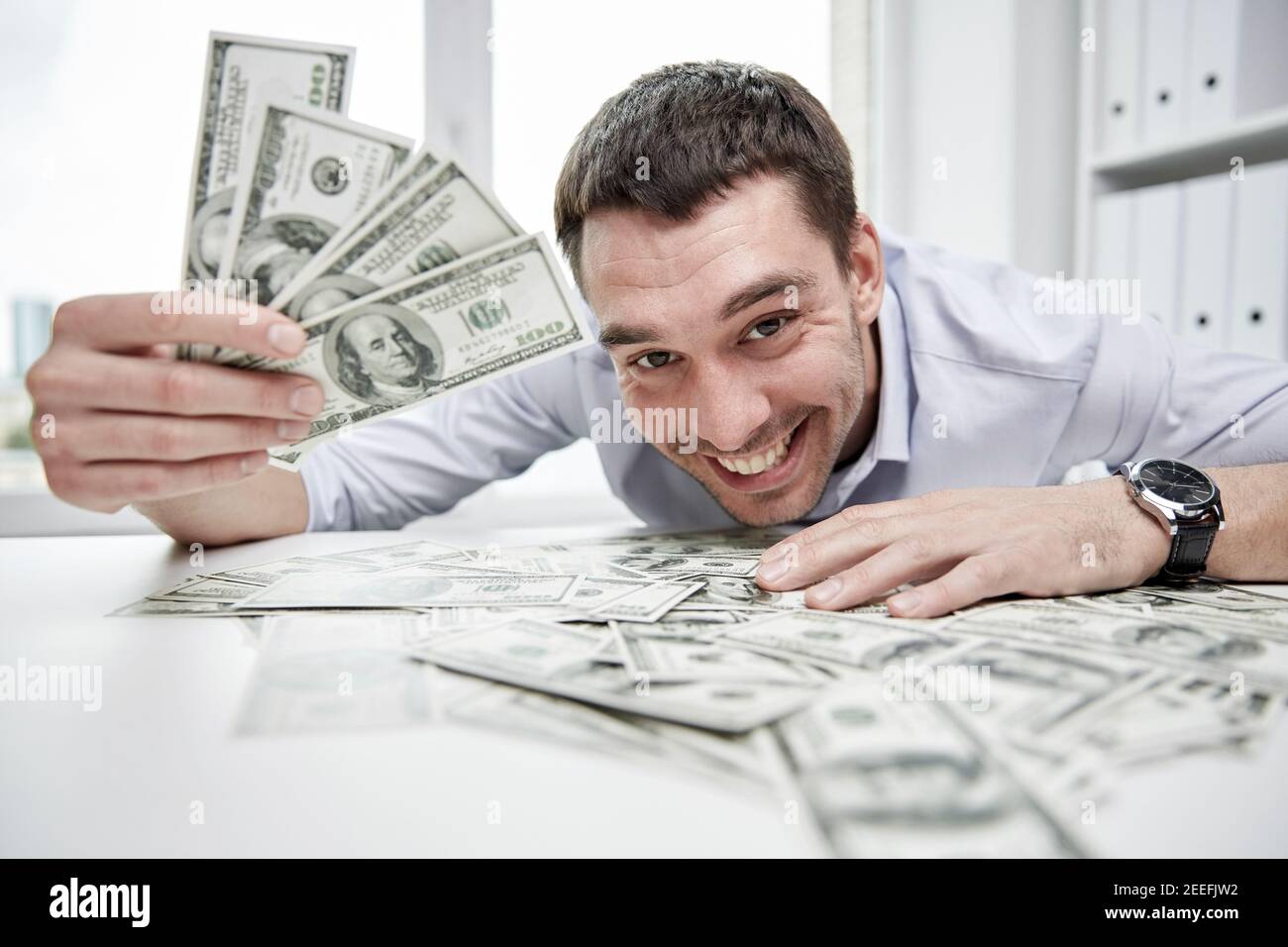 business, people, success and fortune concept - happy businessman with ...