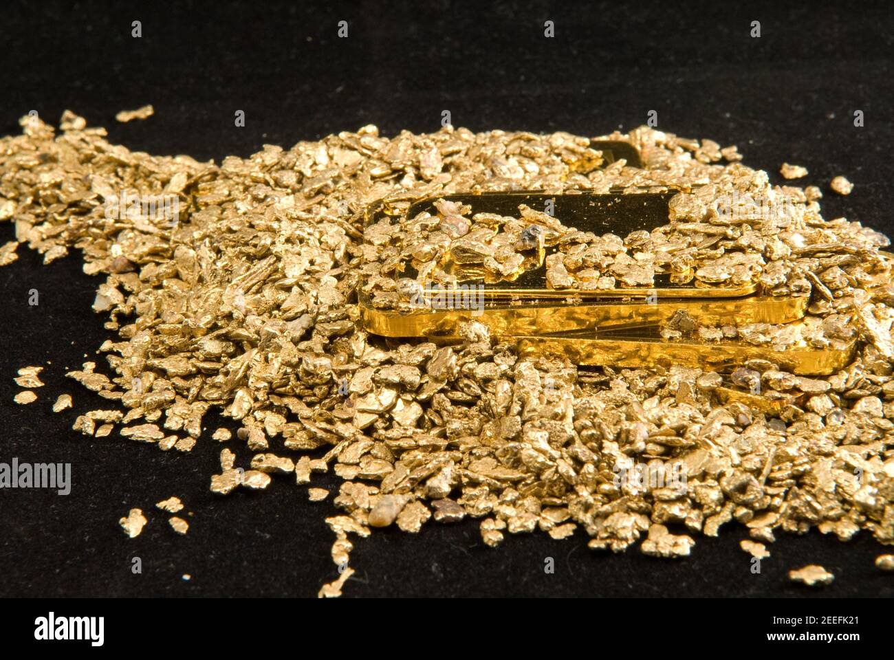 gold in coins, nuggets and ingots Stock Photo - Alamy